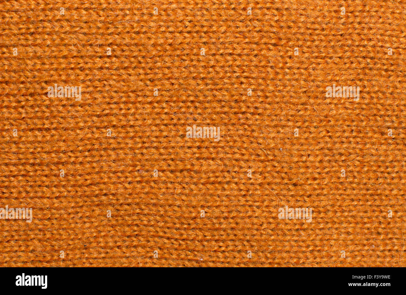 Orange wool knit work Stock Photo - Alamy