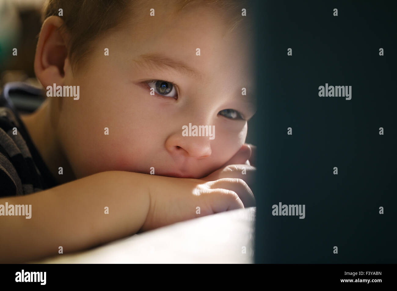 Child watching cartoons hi-res stock photography and images - Alamy