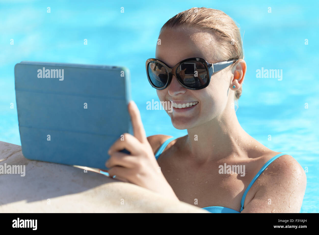 Using Computer In Swimming Pool High Resolution Stock Photography and ...