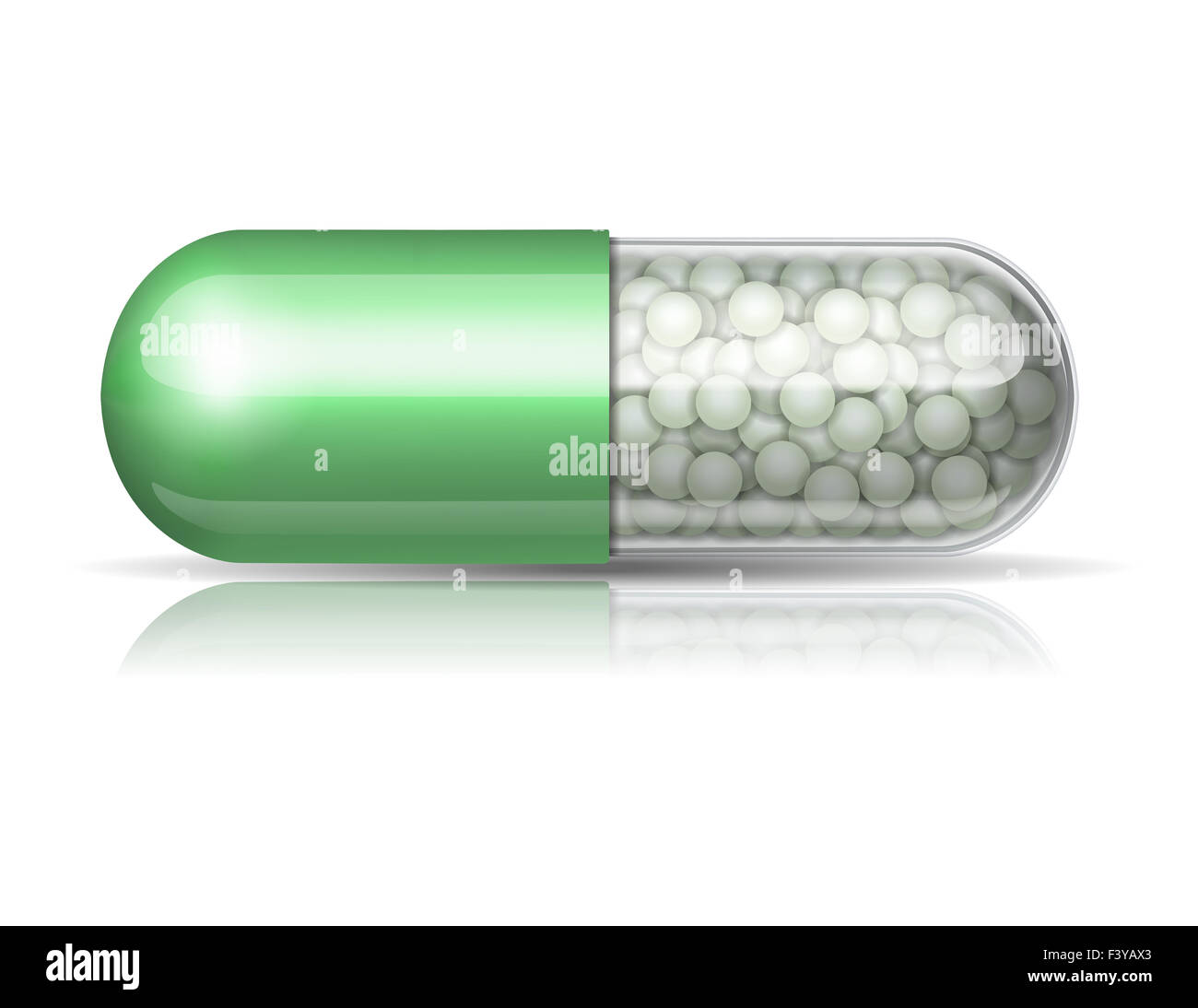 Medical green capsule with granules Stock Photo - Alamy
