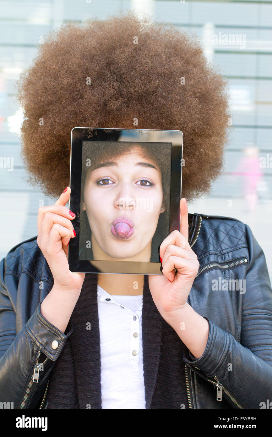 Tablet smile face hi-res stock photography and images - Alamy