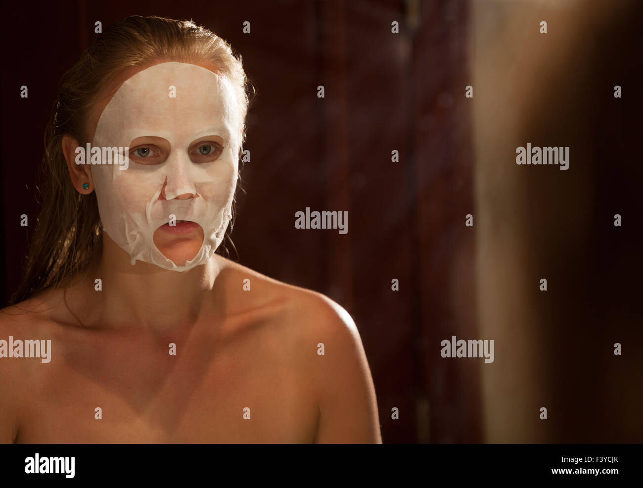 Applying a mask hi-res stock photography and images - Alamy