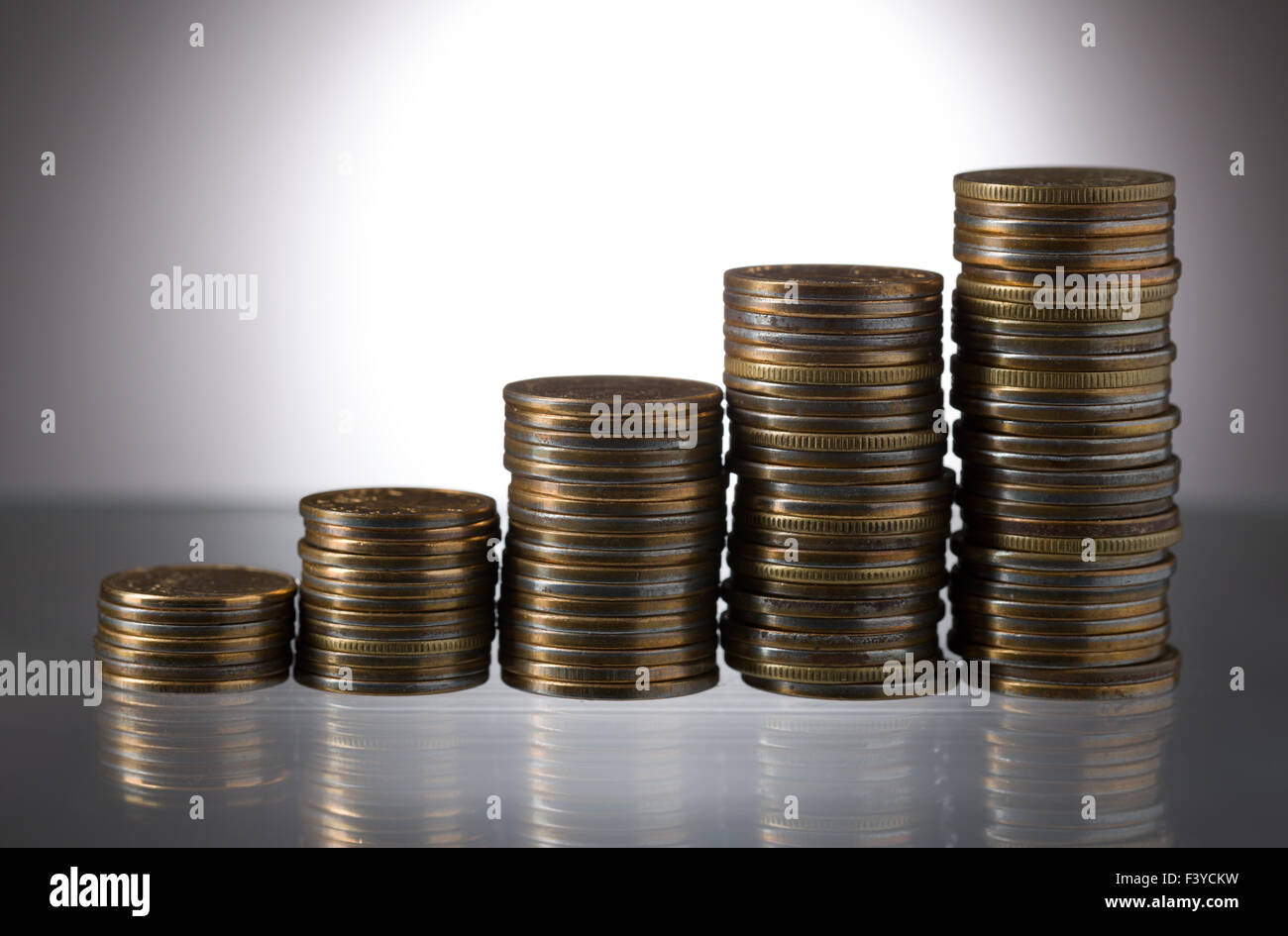 pile of coins Stock Photo - Alamy