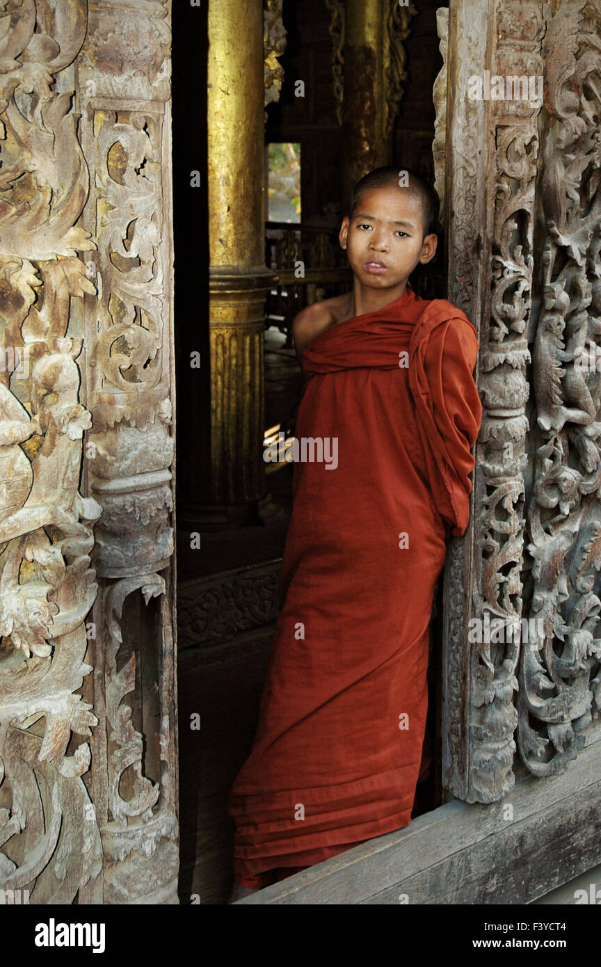Novice monk by door of temple hi-res stock photography and images - Alamy
