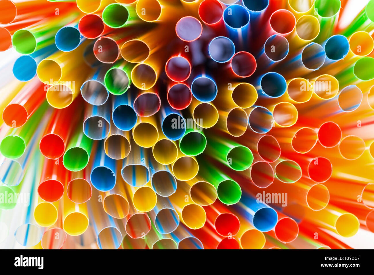 Colored Plastic Drinking Straws closeup Stock Photo - Alamy