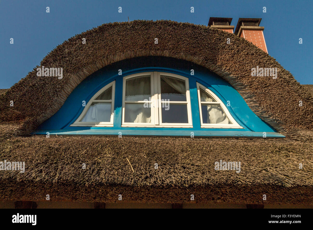 window in a thatched roof Stock Photo - Alamy