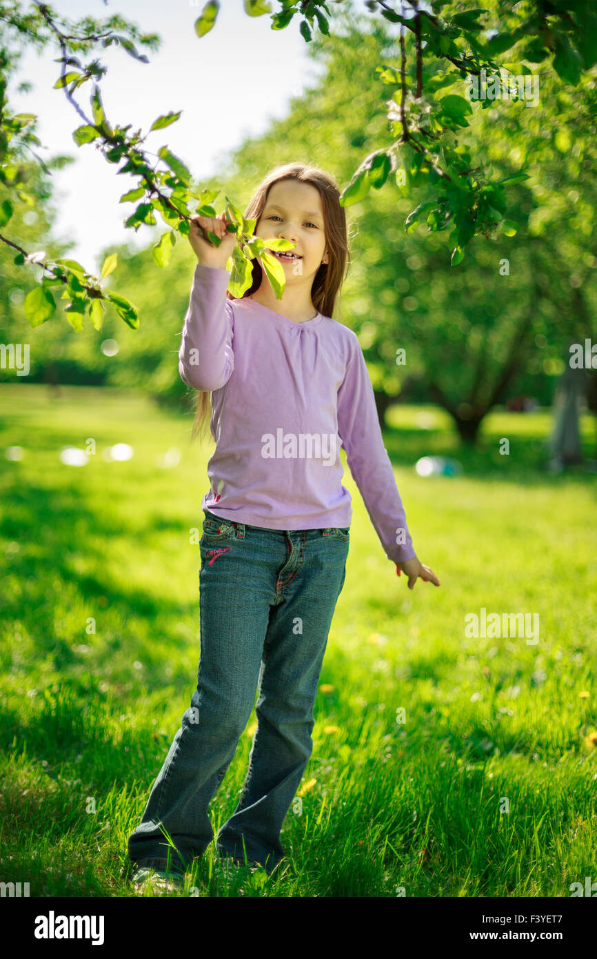 Little girl in park Stock Photo - Alamy