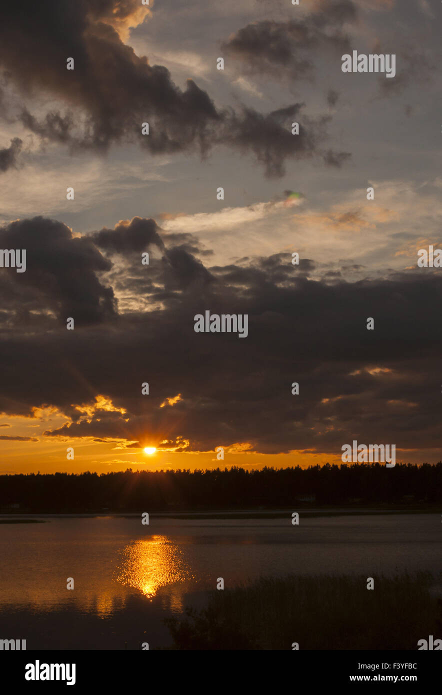 Midsummer sunset Sweden Stock Photo - Alamy