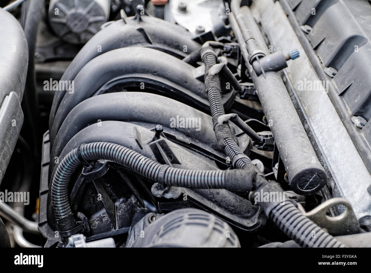 A black interesting car engine close up Stock Photo - Alamy