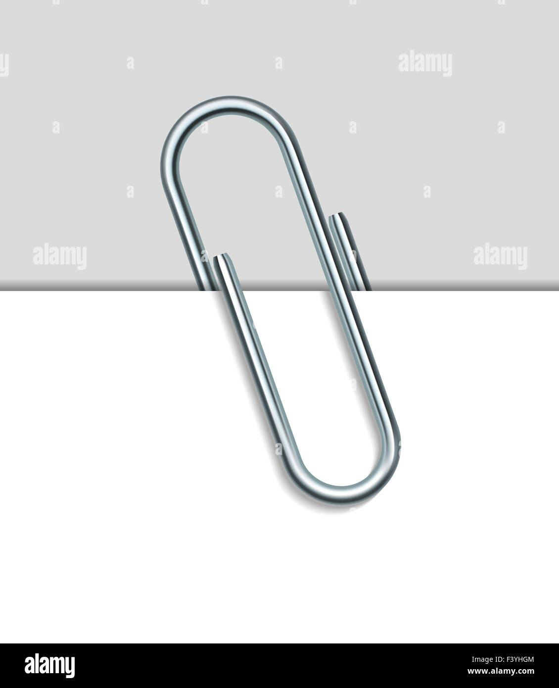 Metal paperclip and paper Stock Photo - Alamy