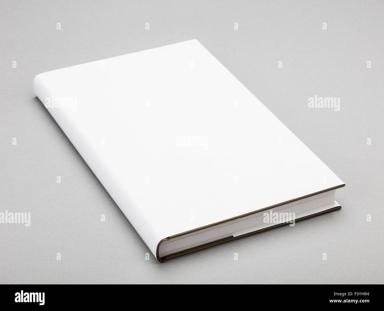 Blank book with white cover Stock Photo - Alamy