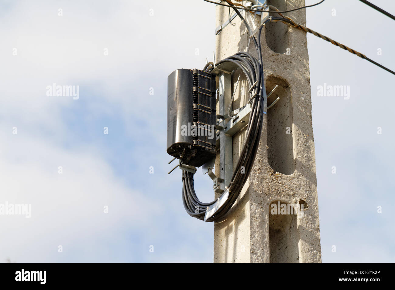 Photo of a high pylon in the town Stock Photo - Alamy