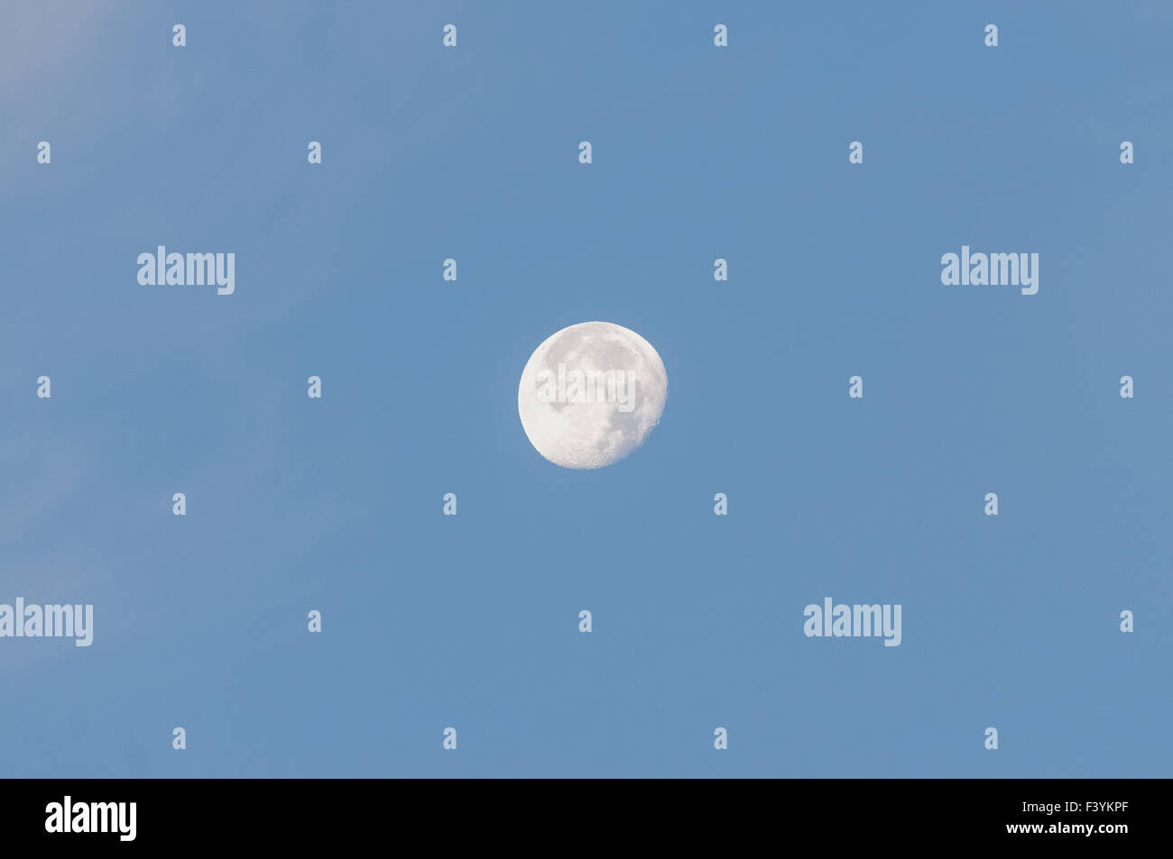 Moon visible during early morning two days after full moon Stock Photo ...