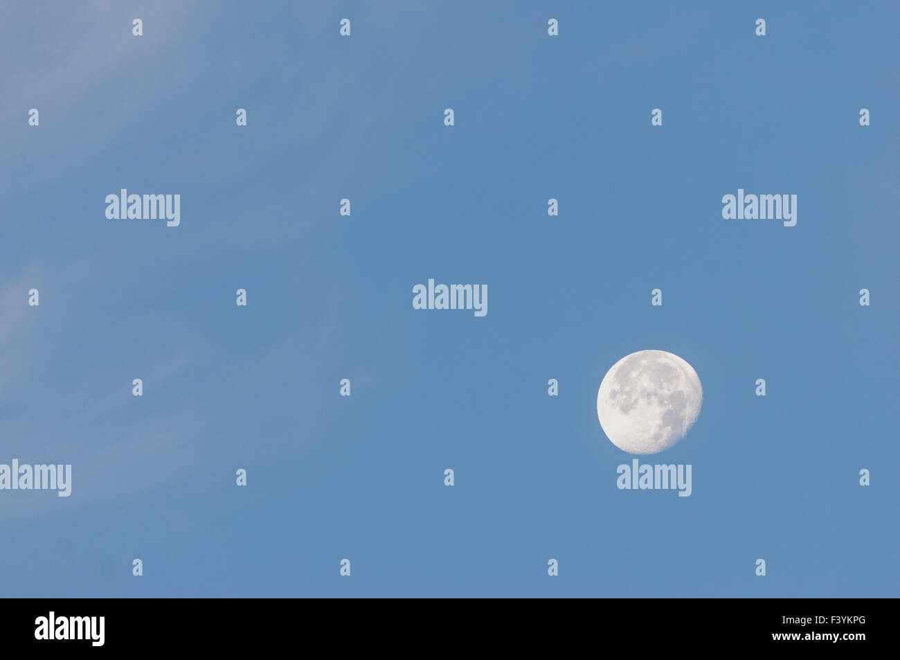 Moon visible during early morning two days after full moon Stock Photo ...