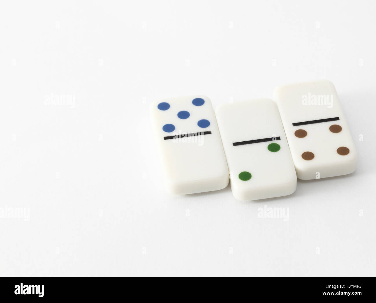 Domino three hi-res stock photography and images - Alamy