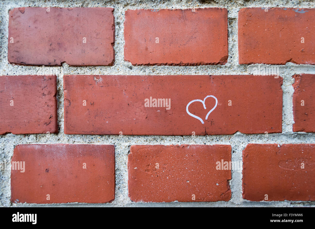 Heart on brick wall Stock Photo - Alamy