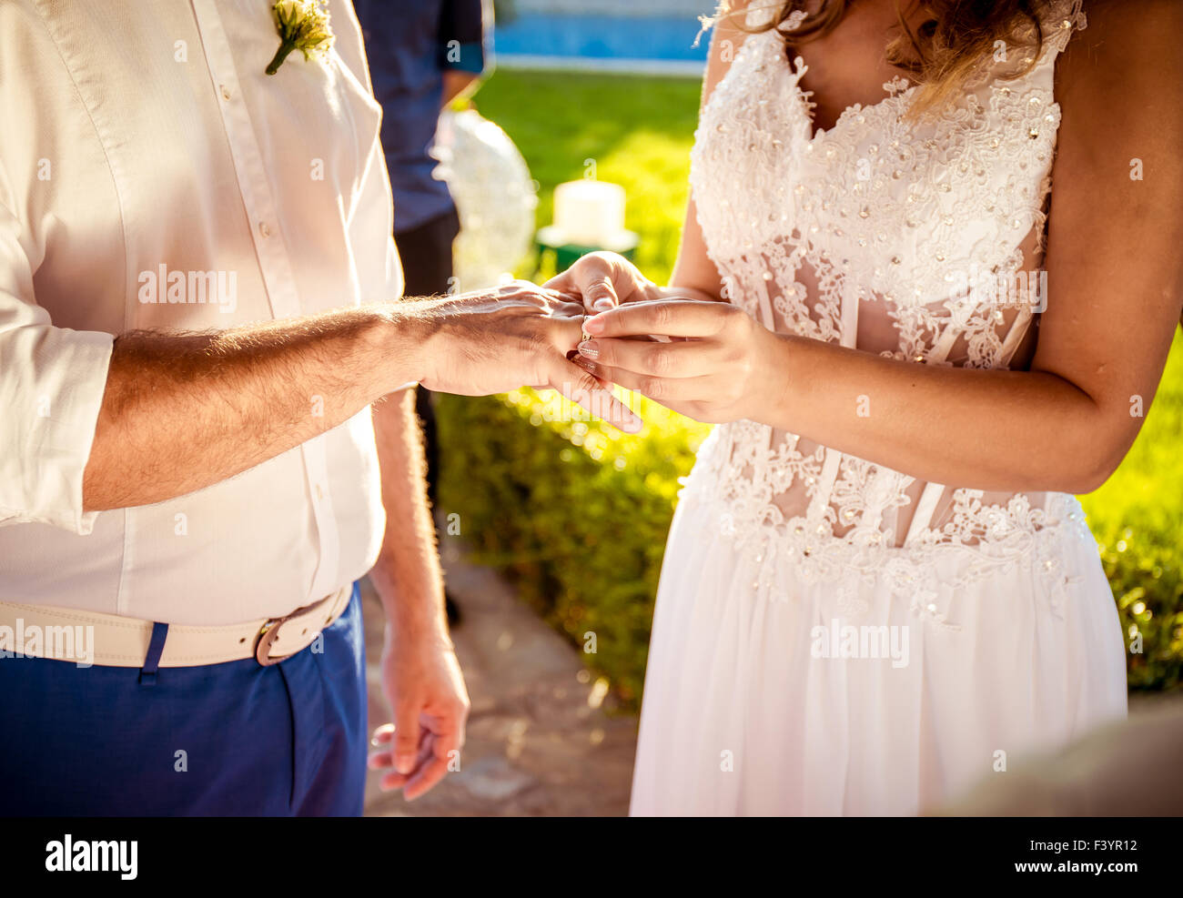 groom and bride hands with wedding rings Stock Photo - Alamy