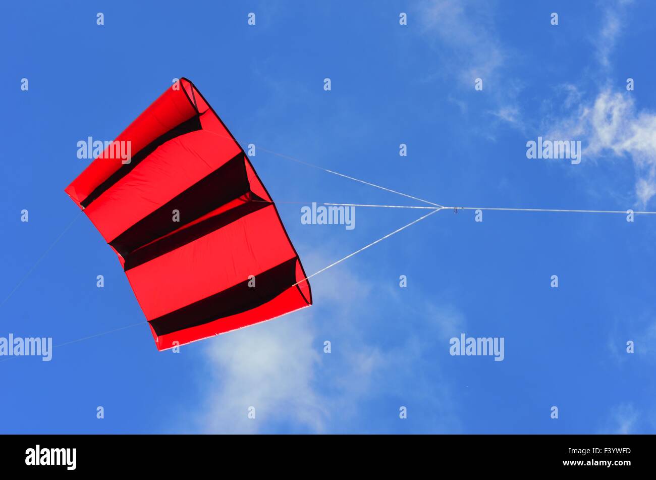 red and black kite in close Stock Photo - Alamy