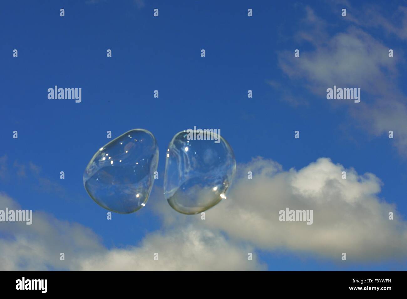 Pair of bubbles in sky Stock Photo - Alamy