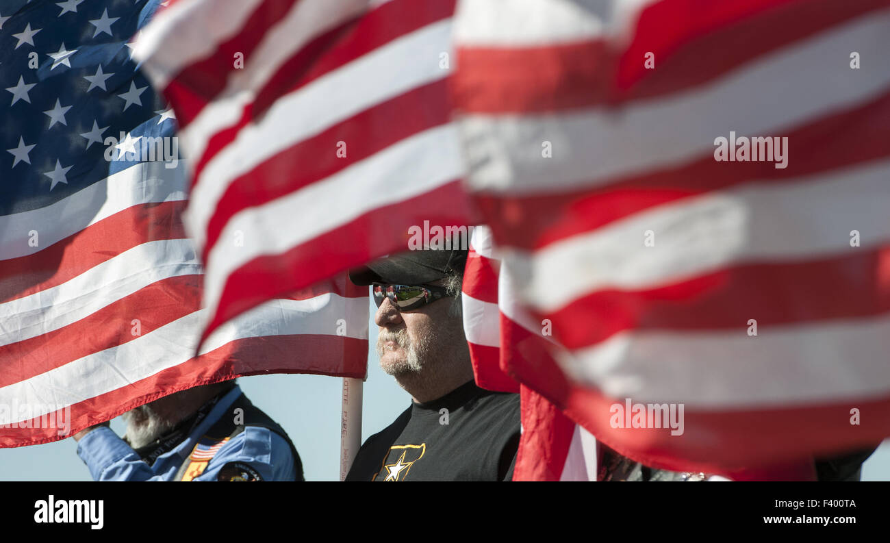 Usa. 13th Oct, 2015. Boomer Montgomery, from Santa Fe, and members of ...