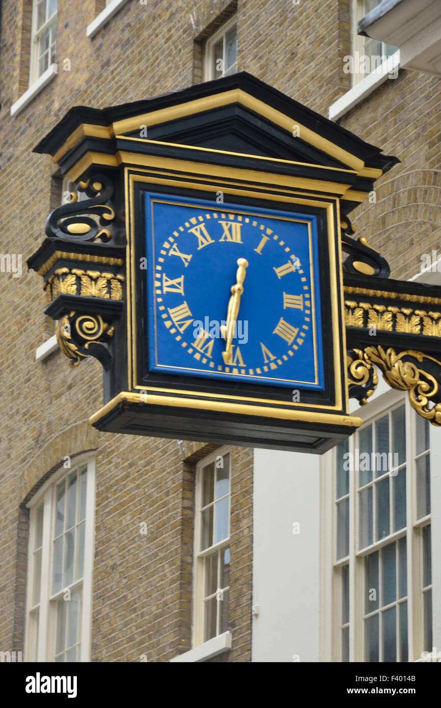 Blue outdoor External clock Stock Photo - Alamy