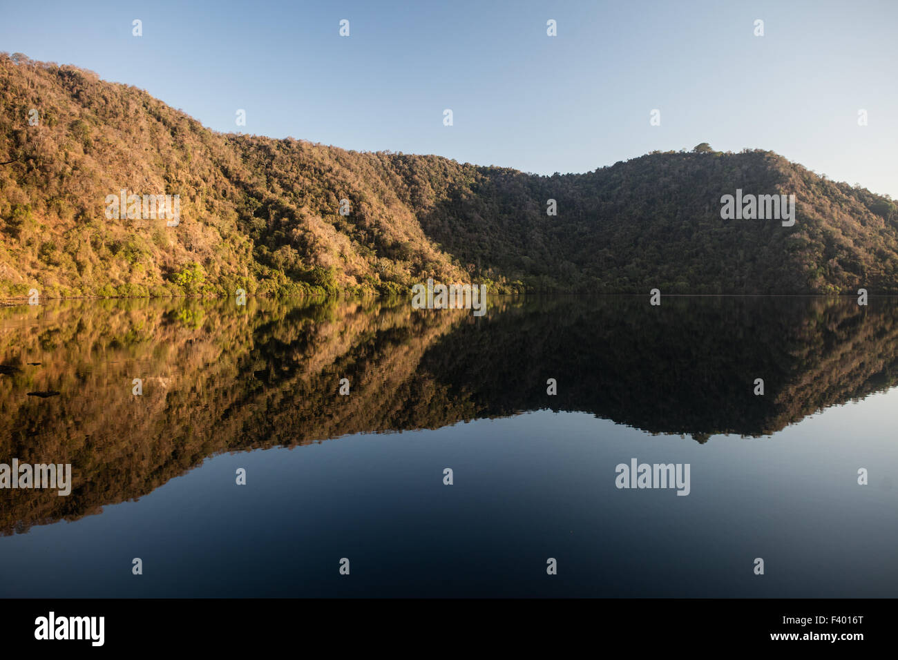 The calm, water-filled caldera of a volcano on Satonda Island in ...