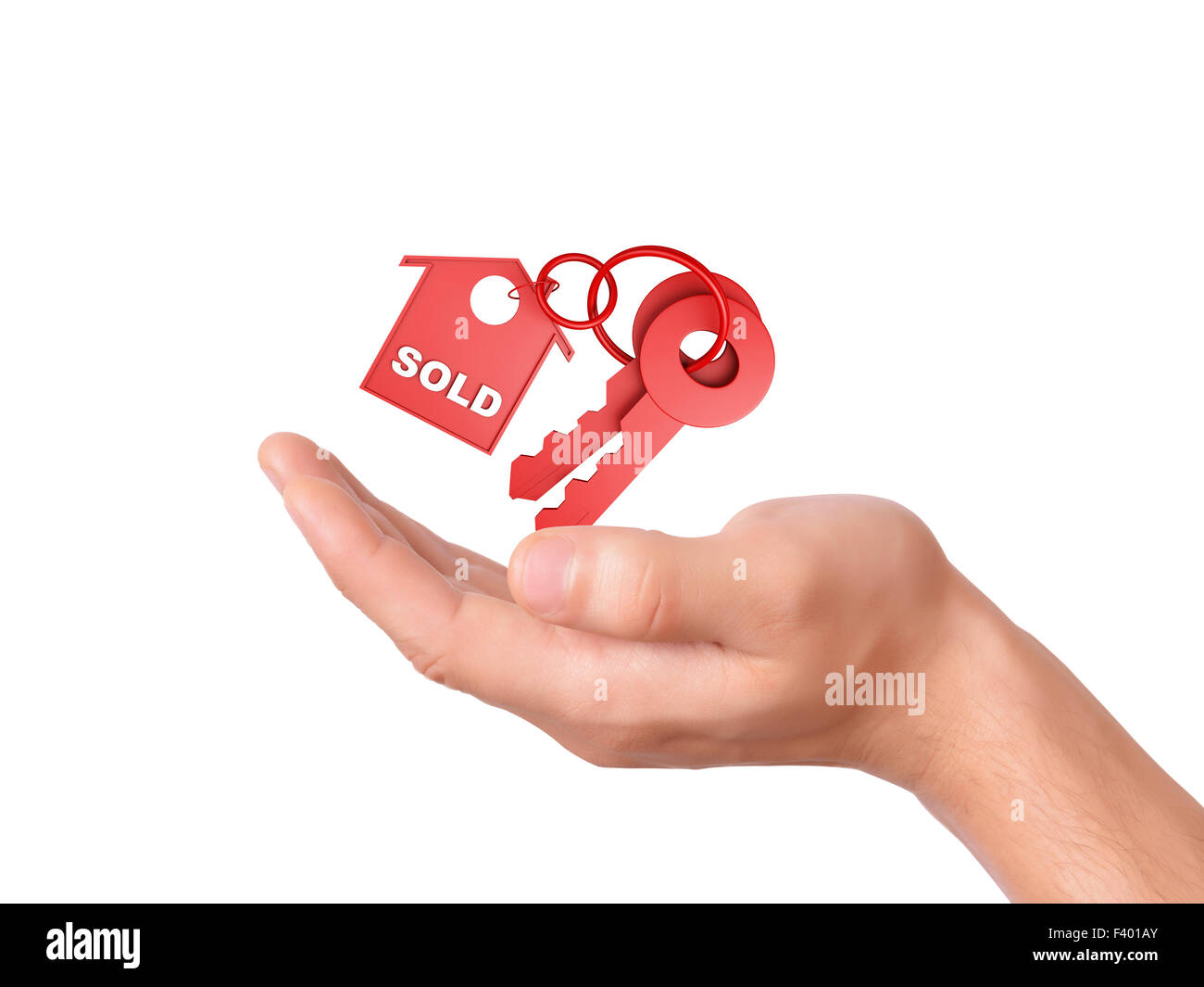 Holding house keys. sold concept Stock Photo - Alamy