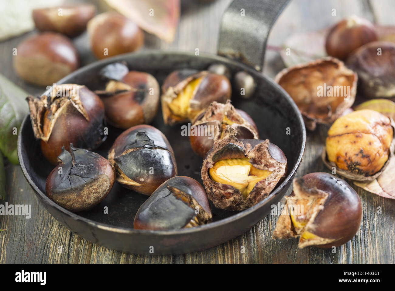 Chestnuts roasted in a frying pan hi-res stock photography and images ...