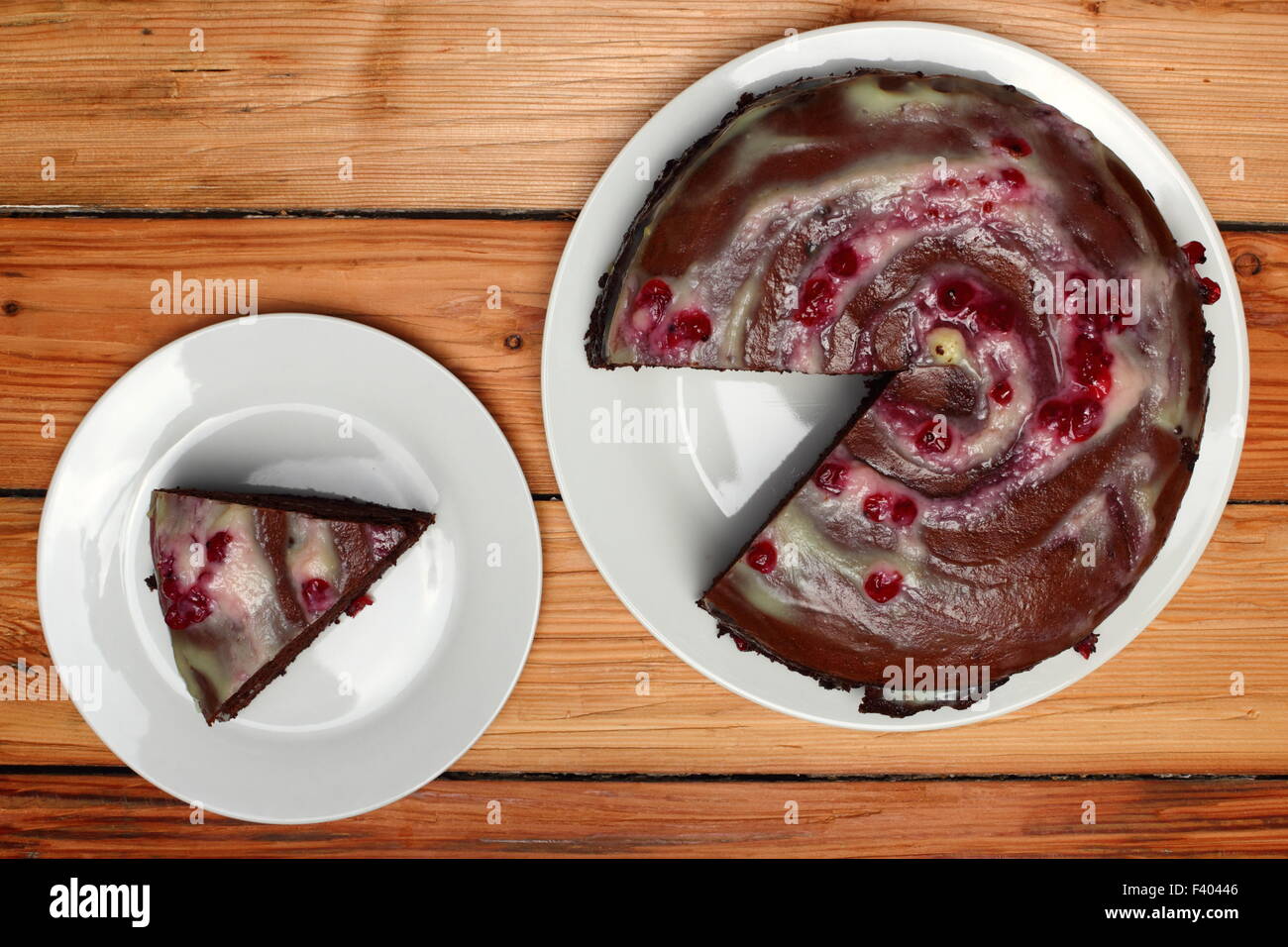 Chocolate Layer Cake with Cream and Red Currant Jam Stock Photo - Alamy