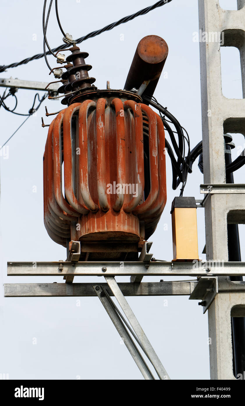 Photo of a high pylon in the town Stock Photo - Alamy