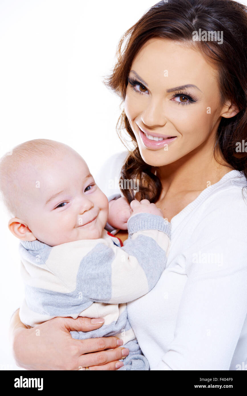 Beautiful young smiling mom hi-res stock photography and images - Alamy