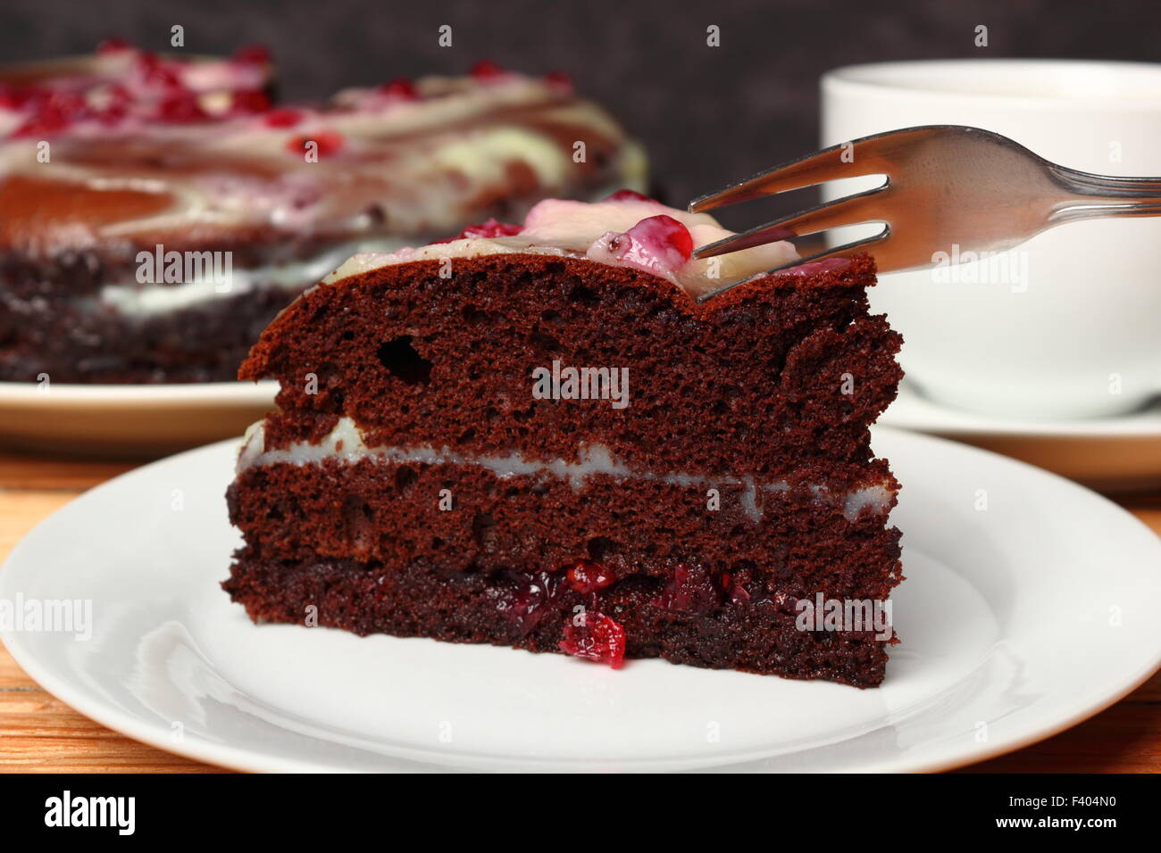 Chocolate Layer Cake with Cream and Red Currant Jam Stock Photo - Alamy