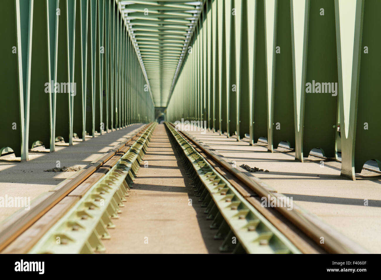 Railway metal bridge perspective view Stock Photo - Alamy