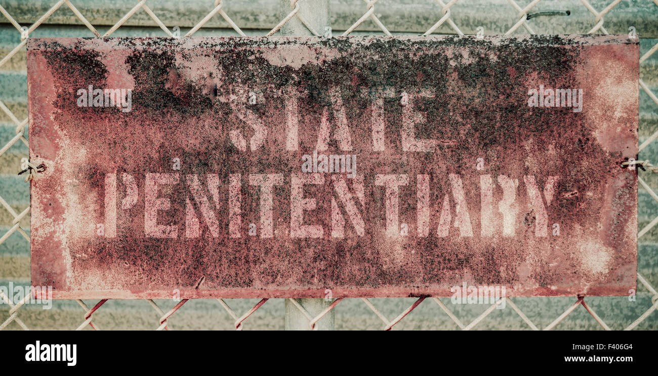 Prisoner behind prison fence hi-res stock photography and images - Alamy