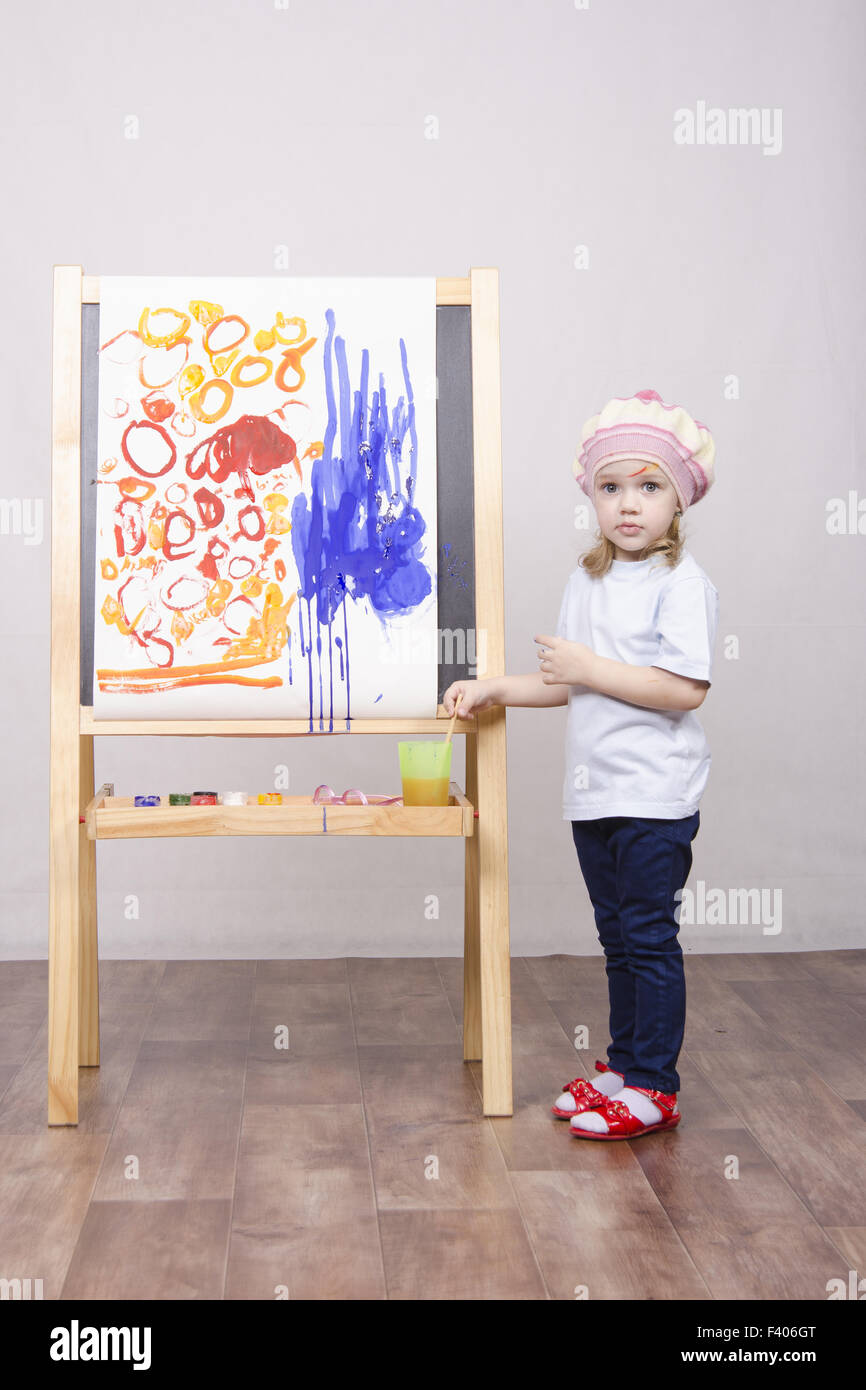 Girl artist paints on canvas Stock Photo - Alamy