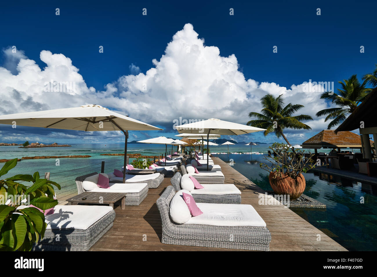 Luxury poolside jetty Stock Photo - Alamy