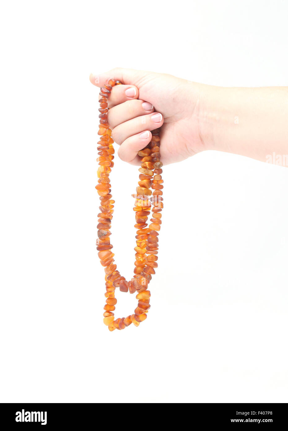 Hand and amber hi-res stock photography and images - Alamy