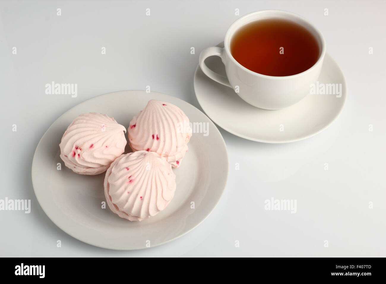 Pink raspberry marshmallow with tea hi-res stock photography and images ...