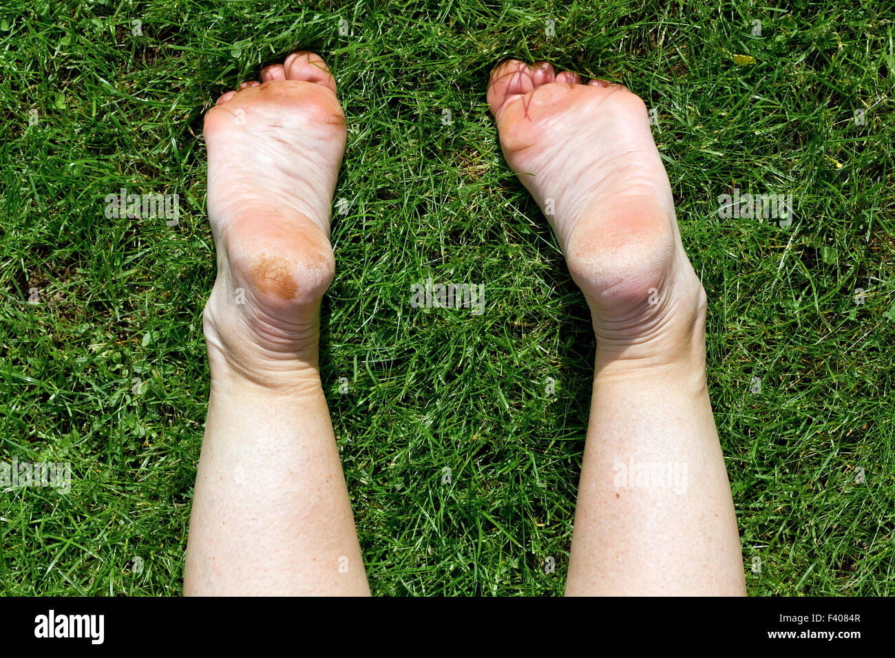 Farmer woman foots Stock Photo - Alamy