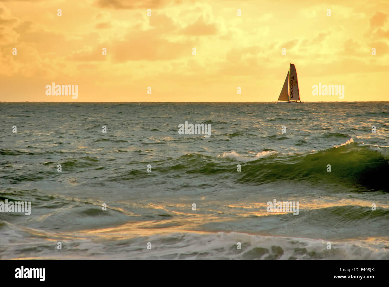 Sunset at the sea Stock Photo - Alamy