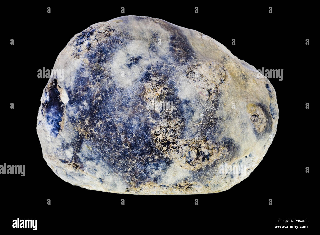 Moon stone isolated on black Stock Photo - Alamy