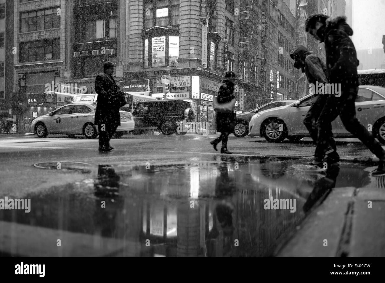Jumping over puddle hi-res stock photography and images - Alamy