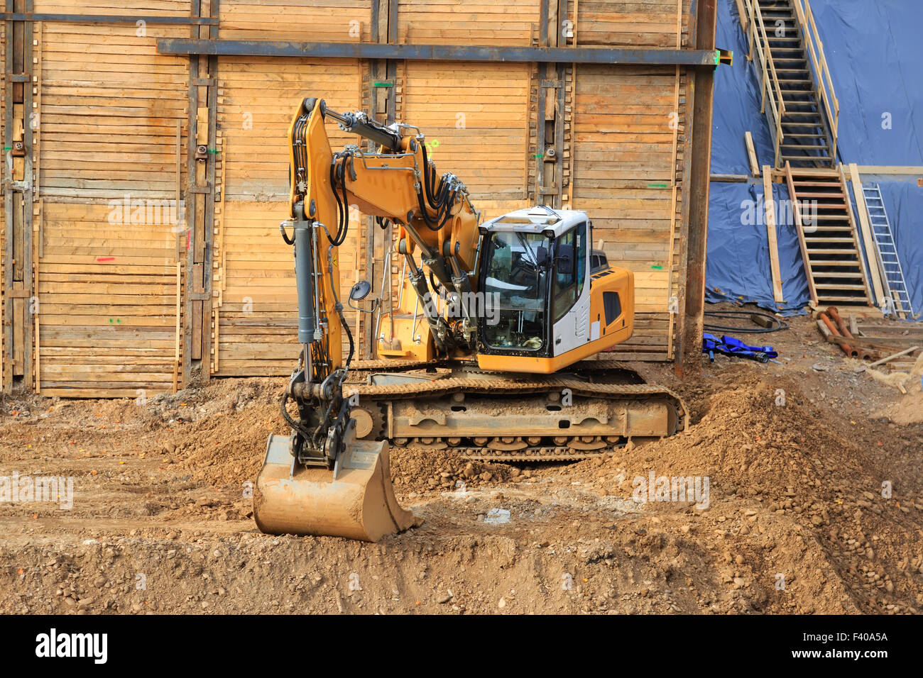 Excavator on the construction site Stock Photo - Alamy