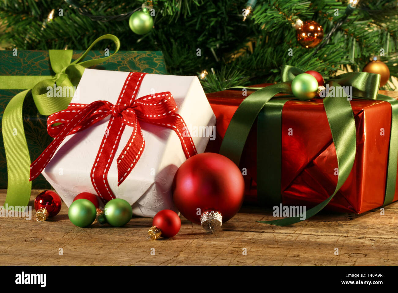 Closeup of gifts under a tree Stock Photo - Alamy