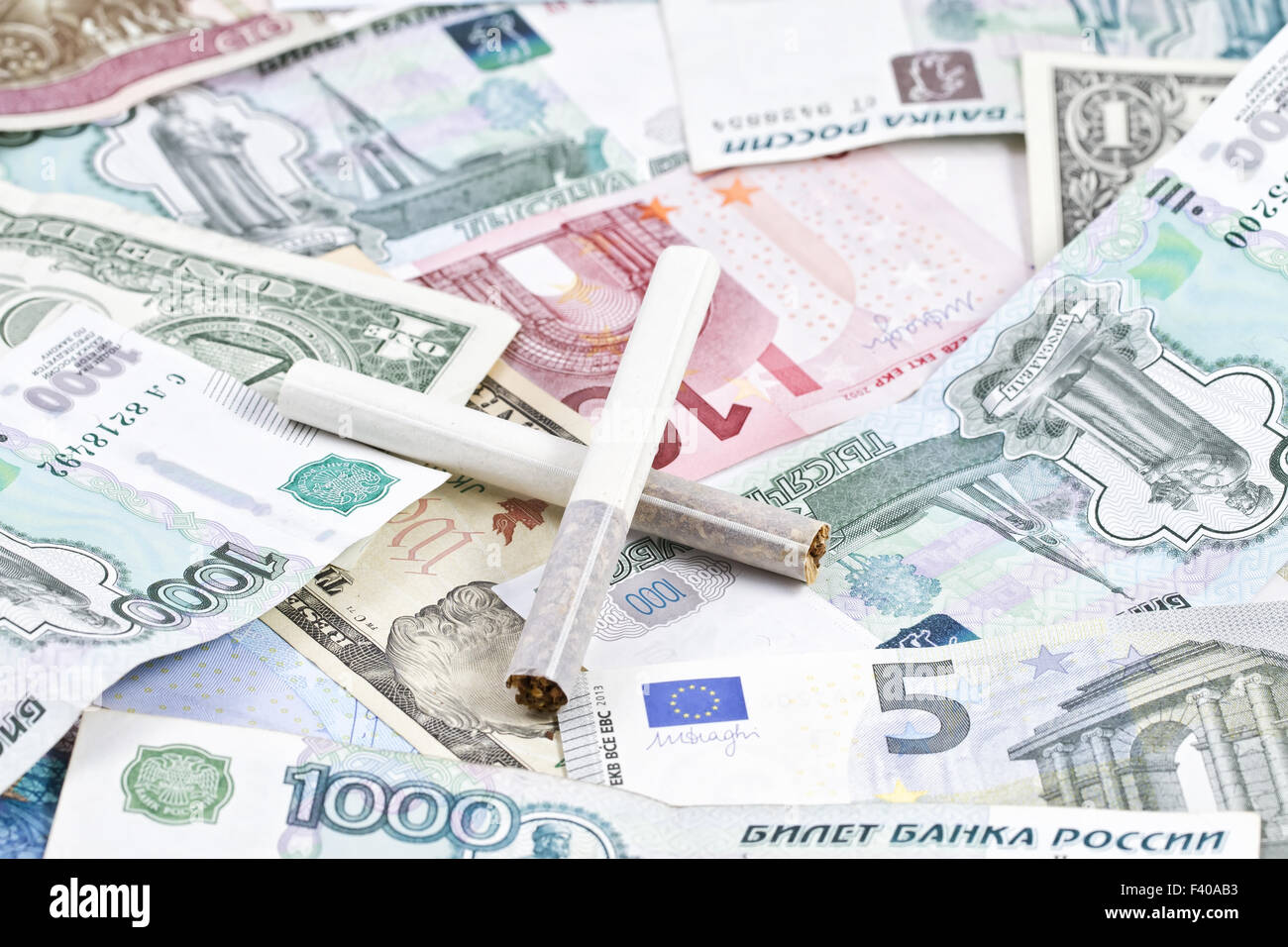 Money and cigarettes hi-res stock photography and images - Alamy