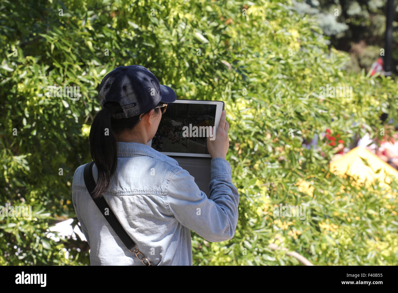 Girl using a digital device Stock Photo - Alamy