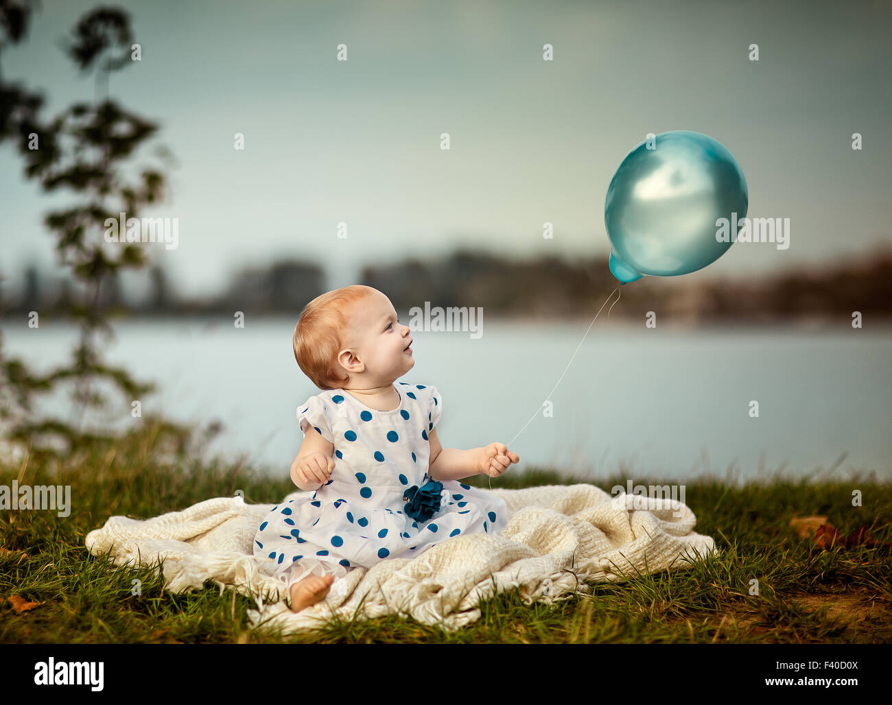 Baby with Balloon Stock Photo - Alamy