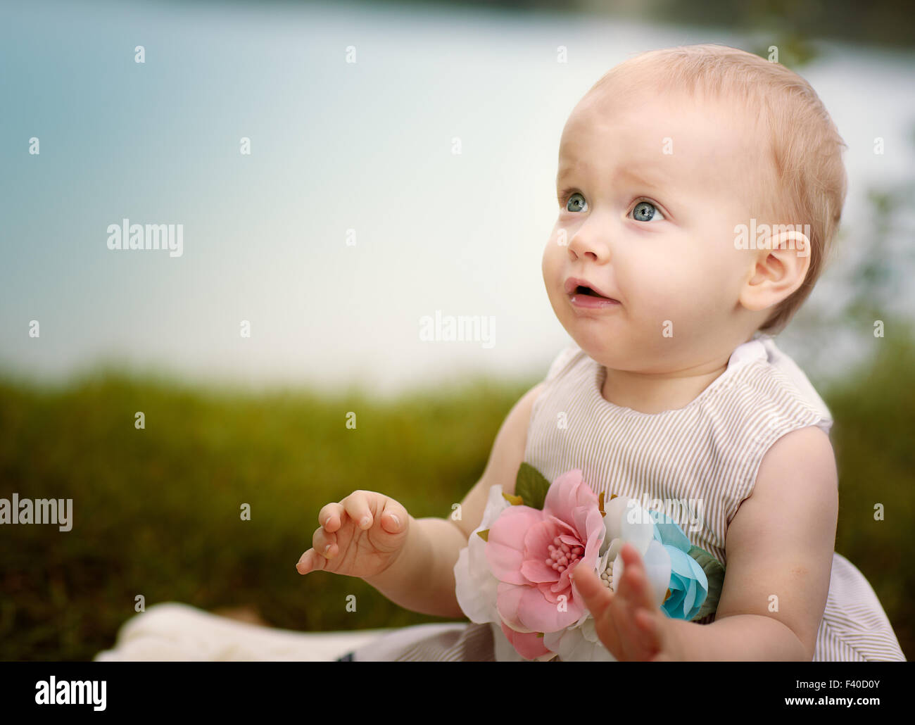 Baby at the Lake Stock Photo - Alamy