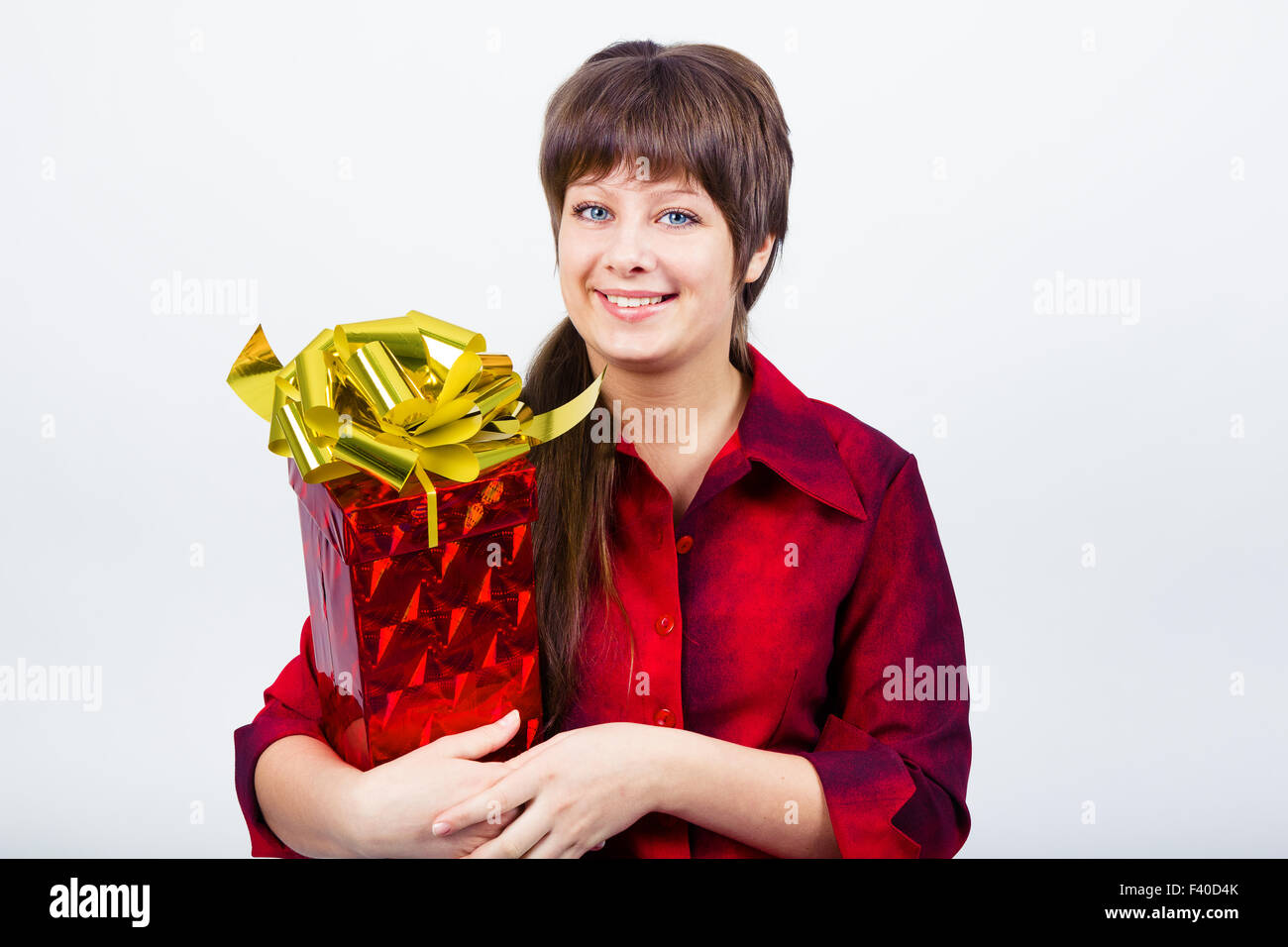 Young girl with a gift box Stock Photo - Alamy