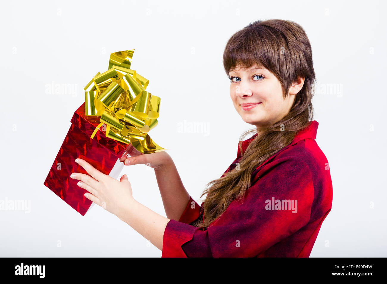 Young girl with a gift box Stock Photo - Alamy